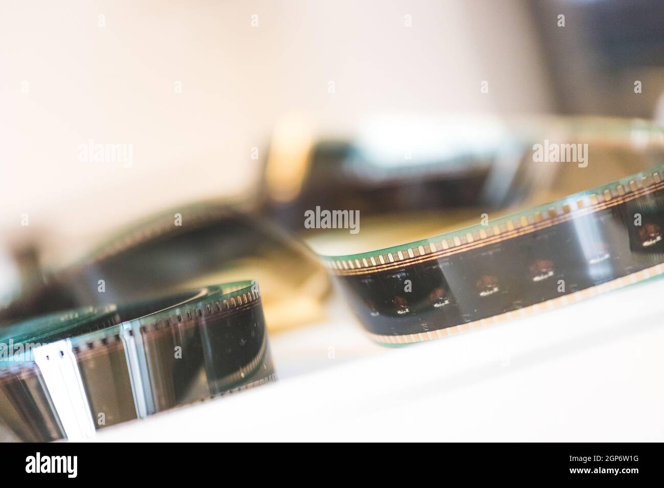 Filmstrip or film reel on a cutting table, vintage film production in ...