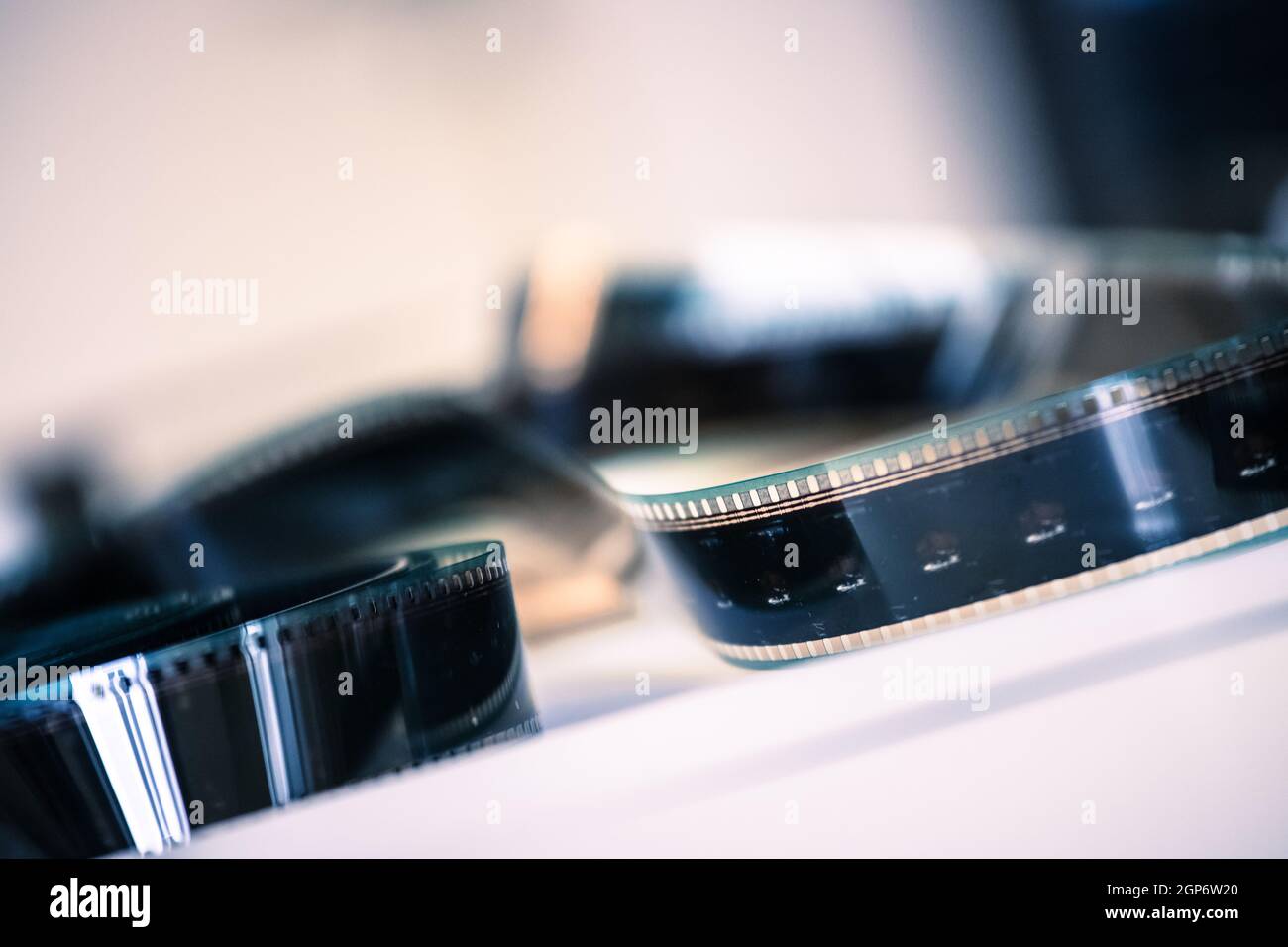 Filmstrip or film reel on a cutting table, vintage film production in ...