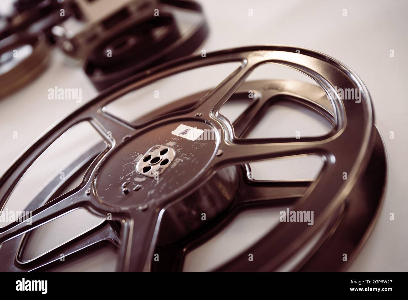 Metallic vintage cinema film reel, close up Stock Photo - Alamy