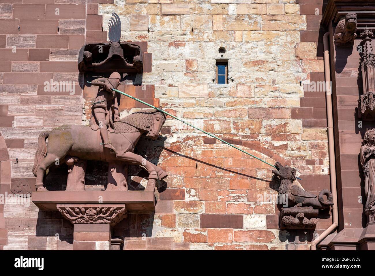 Statue of Saint George, dragon slayer and martyr on the facade of Basel ...
