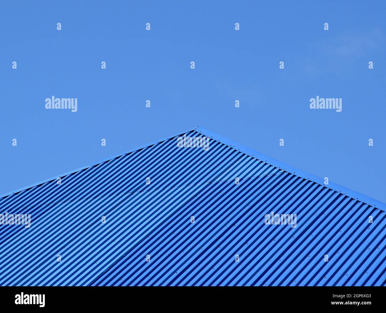 Blue roof metal sheets. Modern types of roofing materials Stock Photo ...