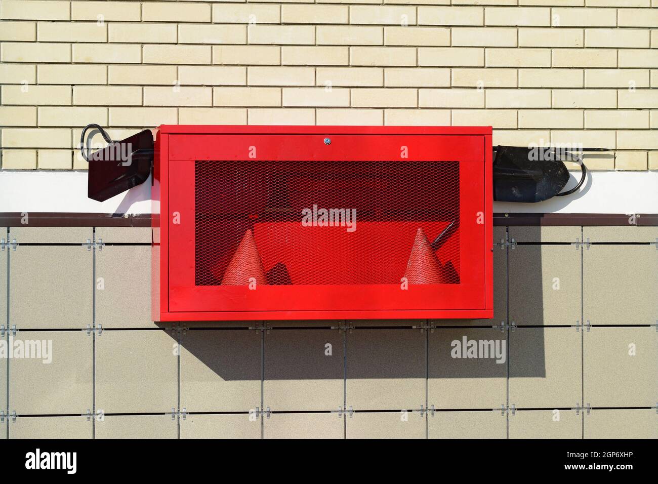 Fire Shield on the wall. Set primary fire extinguishing equipment Stock ...