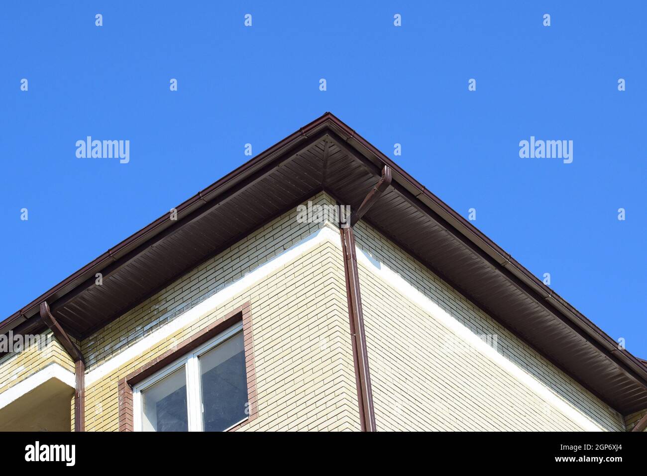 The roof of a multistory building. The roof of the metal sheets ...