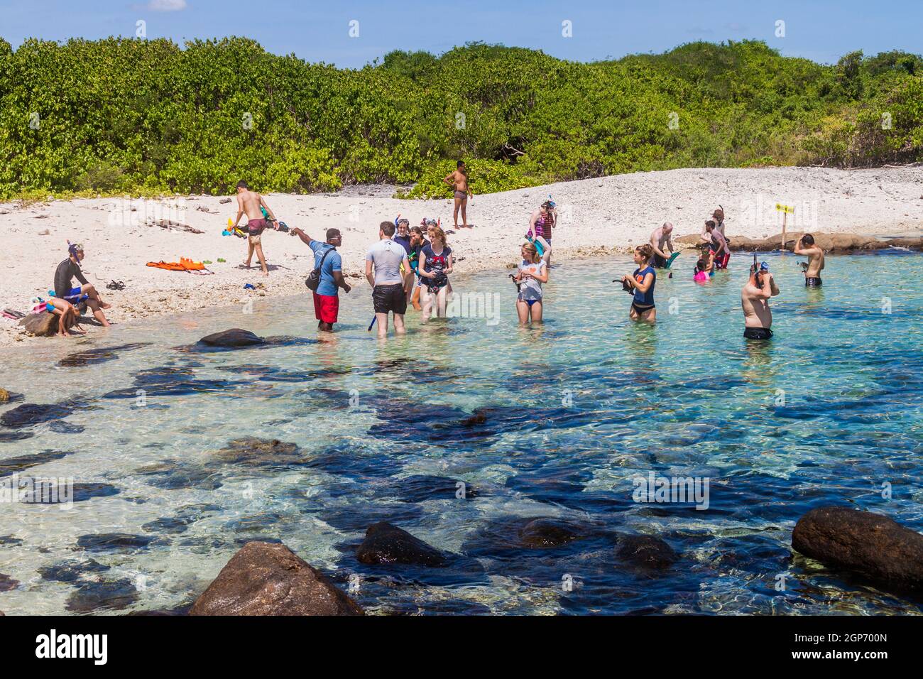 PIGEON ISLAND, SRI LANKA - JULY 25, 2016: People snorkel on a coral ...