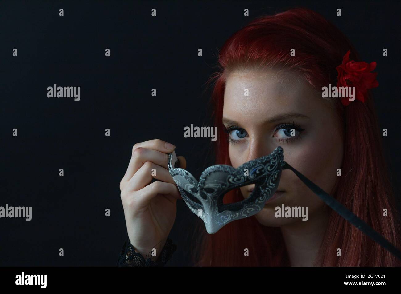 Mystery pretty redhead woman hi-res stock photography and images - Alamy