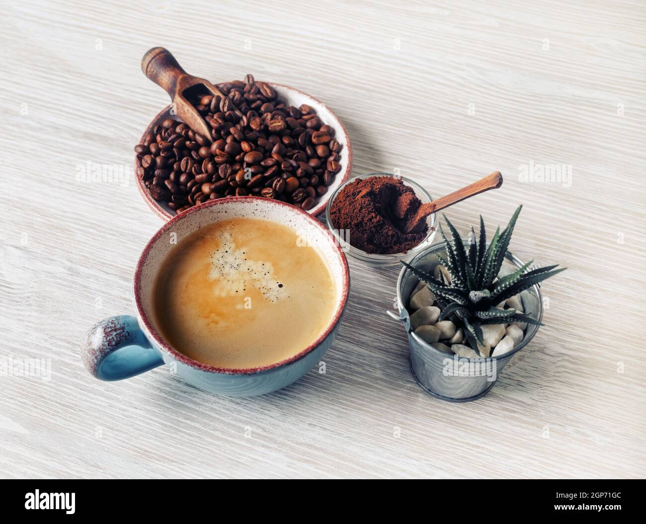 Photo of fresh tasty coffee on light wood table background. Coffee cup ...