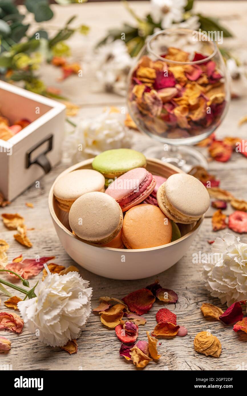 Pile of macaroons. Still life in vertical format with traditional ...