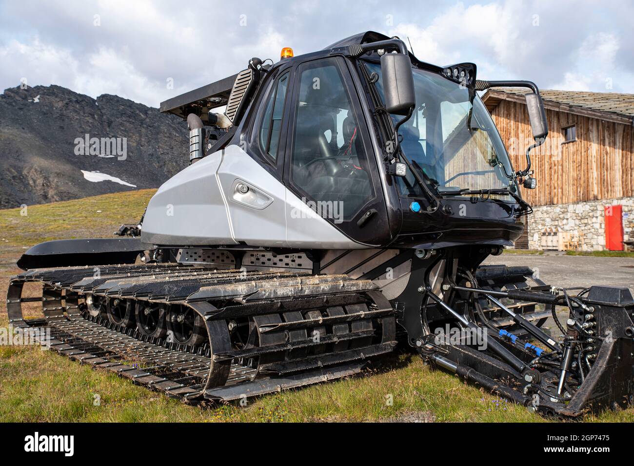Close-up of a grooming machine for slope maintenance Stock Photo - Alamy