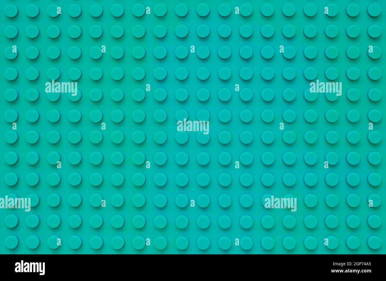 Green Interlocking plastic brick texture pattern Stock Photo - Alamy