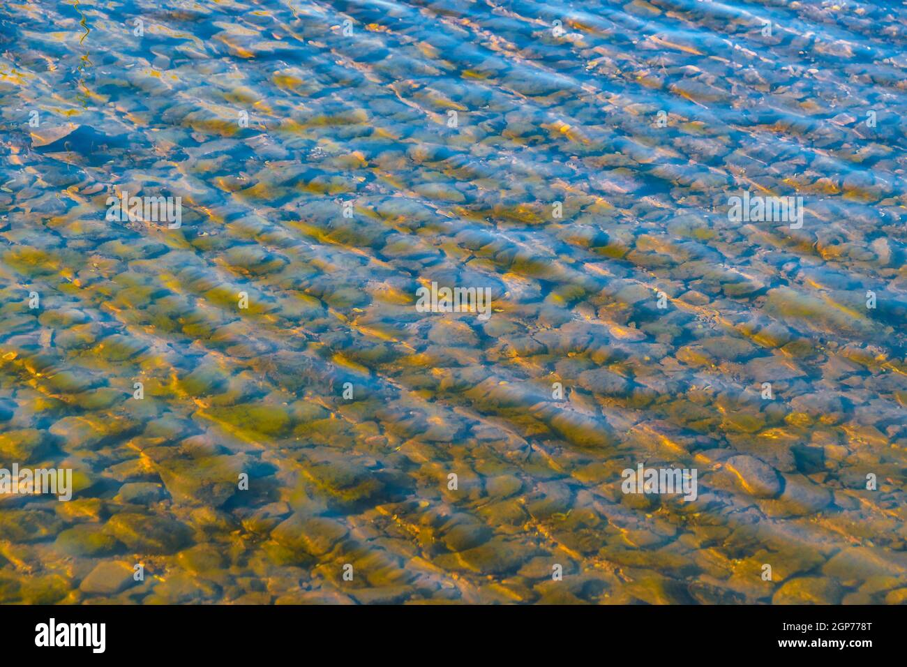 Flat river with rocky bottom, arequita national park, lavalleja ...
