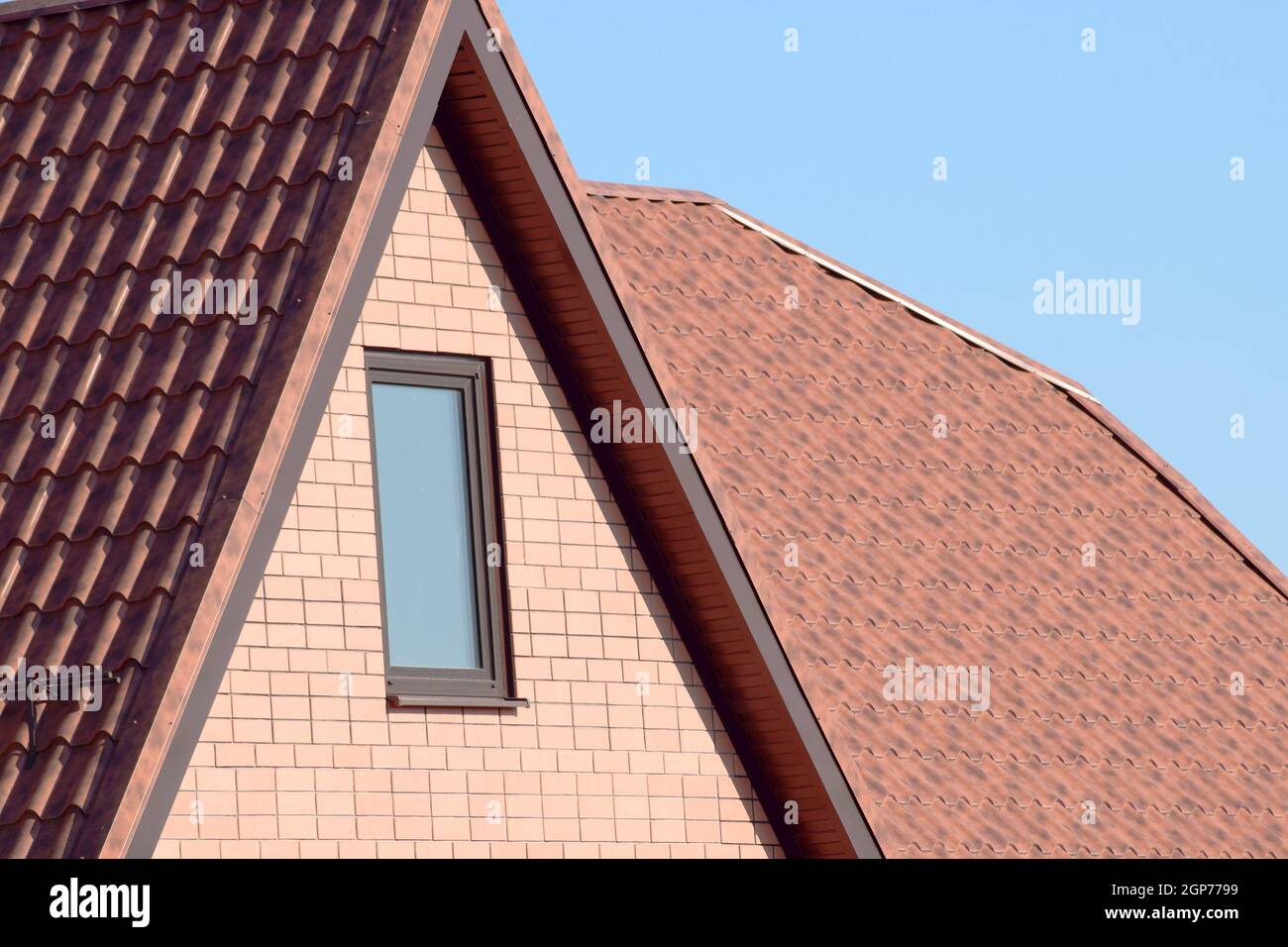 The roof of corrugated sheet. Roofing of metal profile wavy shape Stock ...