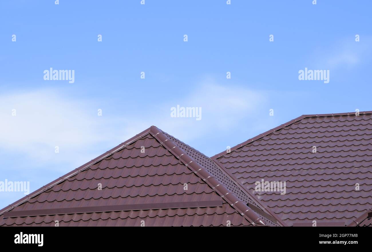 The roof of corrugated sheet. Roofing of metal profile wavy shape Stock ...