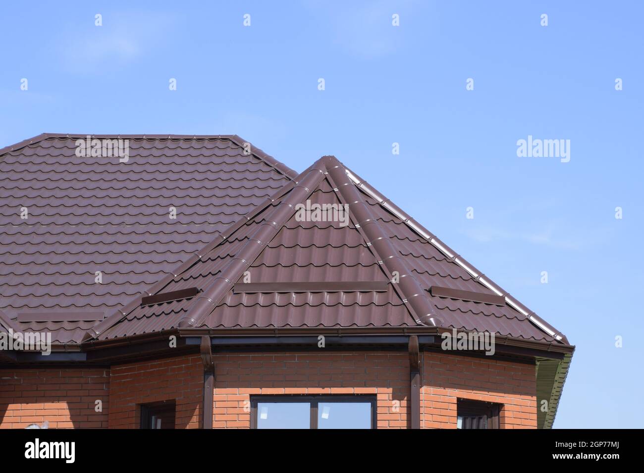 The roof of corrugated sheet. Roofing of metal profile wavy shape Stock ...