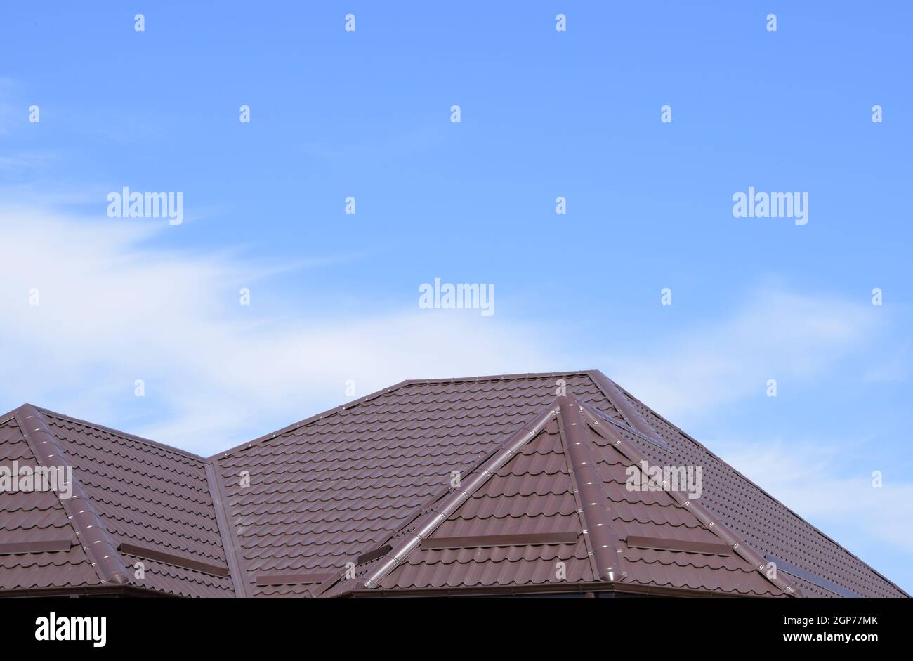 The roof of corrugated sheet. Roofing of metal profile wavy shape Stock ...