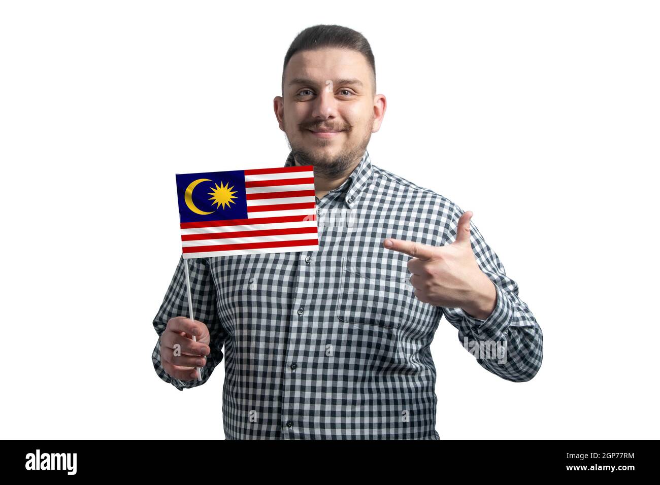 White guy holding a flag of Malaysia and points the finger of the other ...