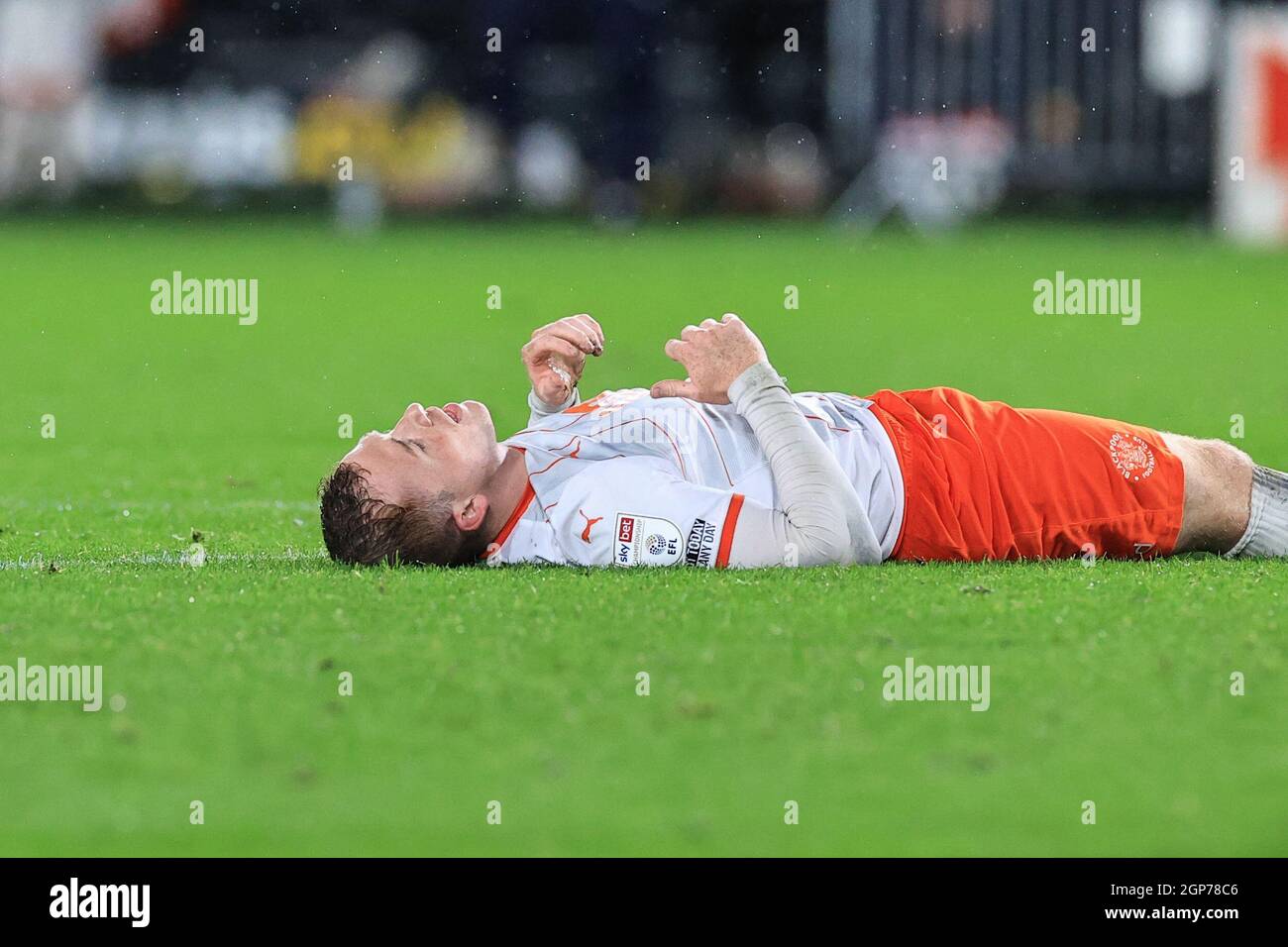 Hull, UK. 28th Sep, 2021. Shayne Lavery #19 of Blackpool reacts after ...
