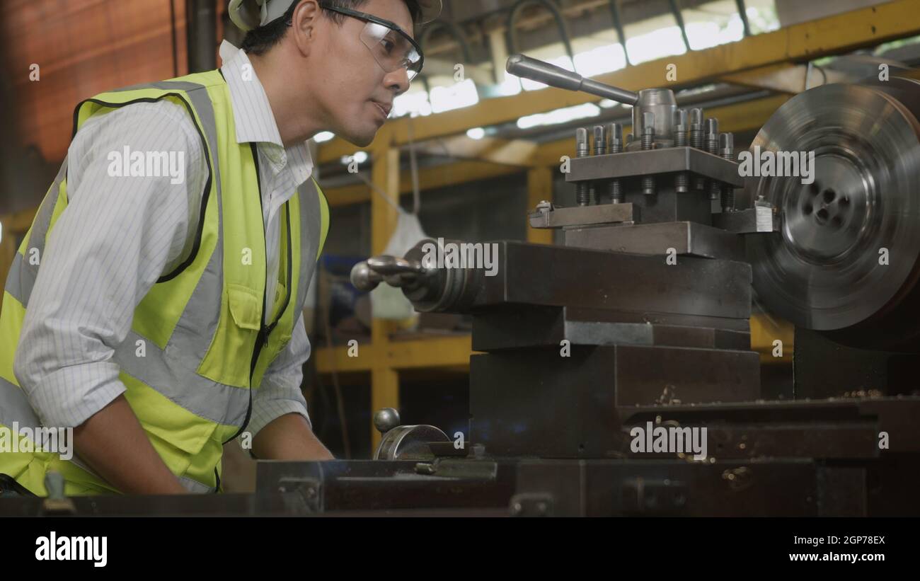 Asian professional mechanical engineer or operation man wear uniform ...