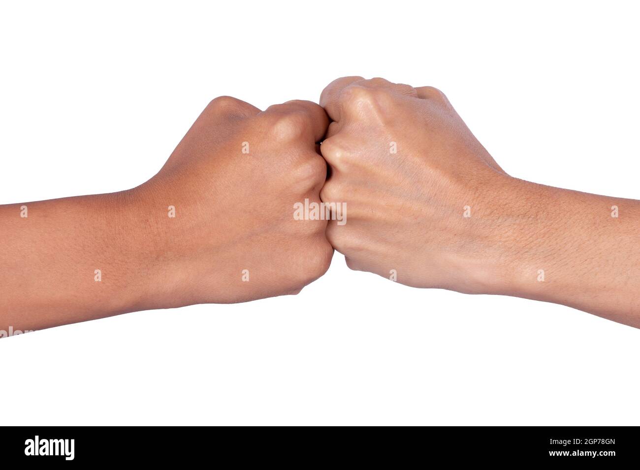 Female hands making signs with their fists closed touching each other ...