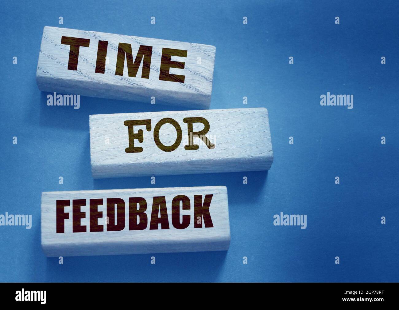 Time fir feedback text on wooden blocks. Product or service evaluation ...