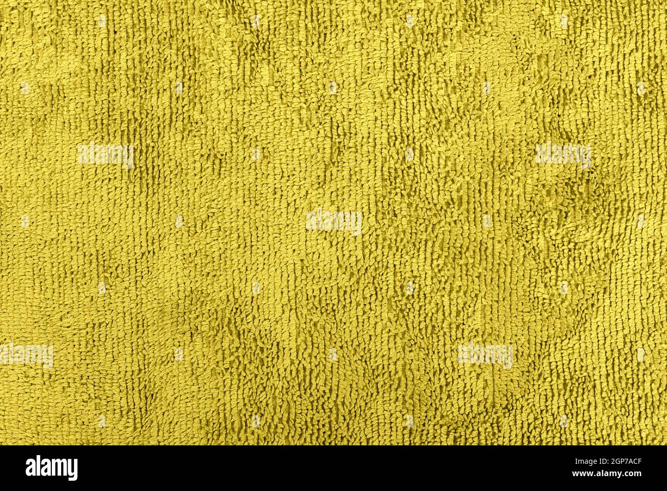 Background or texture made of yellow microfiber fabric Stock Photo - Alamy
