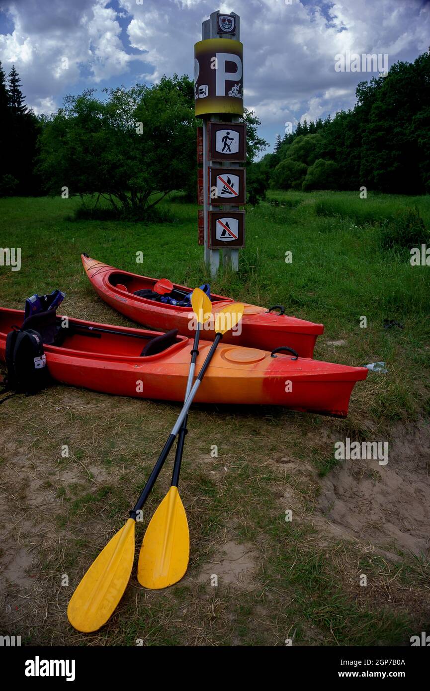 Kayaks on the ground Stock Photo - Alamy