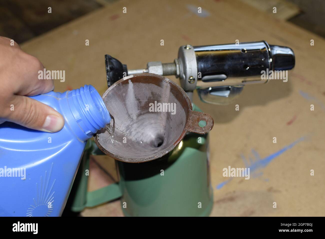 Pouring fuel fire hi-res stock photography and images - Alamy