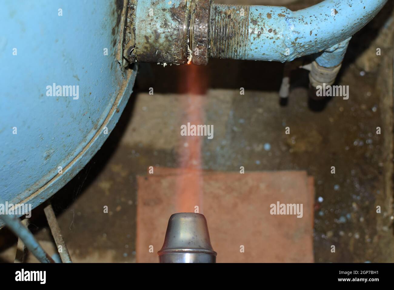 Heating a steel pipe with a blowtorch. The flame of a blowtorch Stock ...