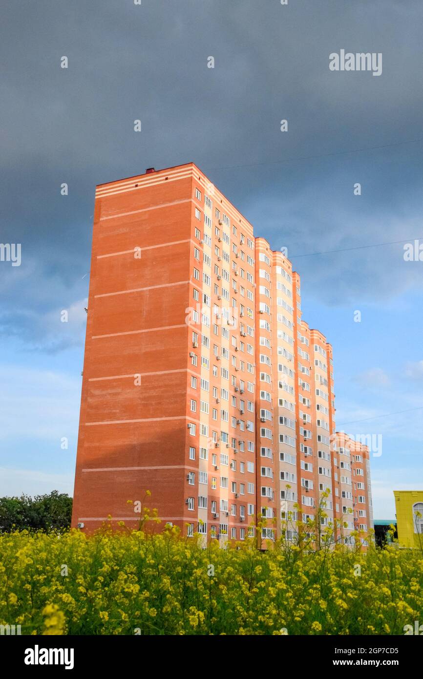 New storey residential building on the city street. Residential houses ...