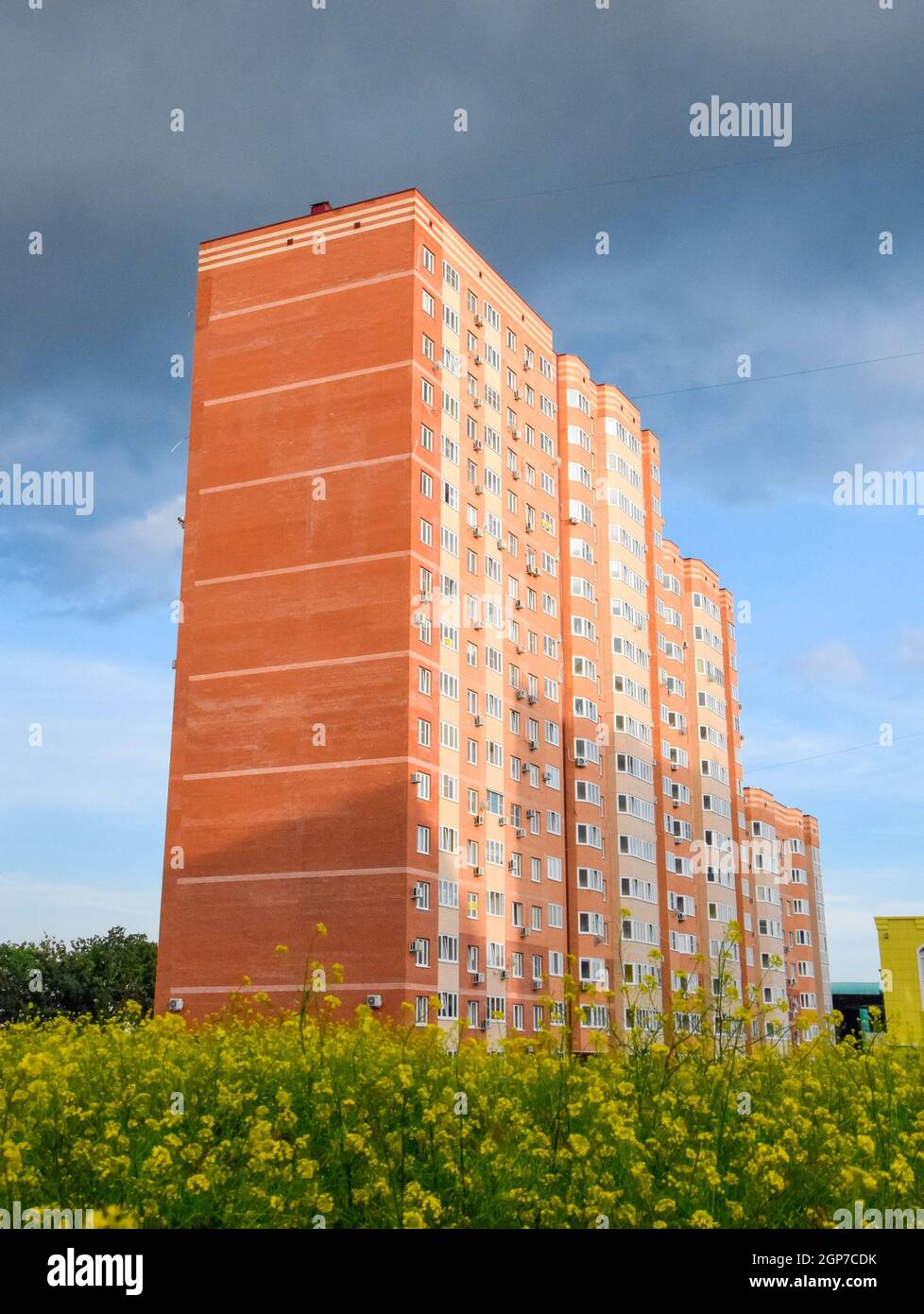 New storey residential building on the city street. Residential houses ...