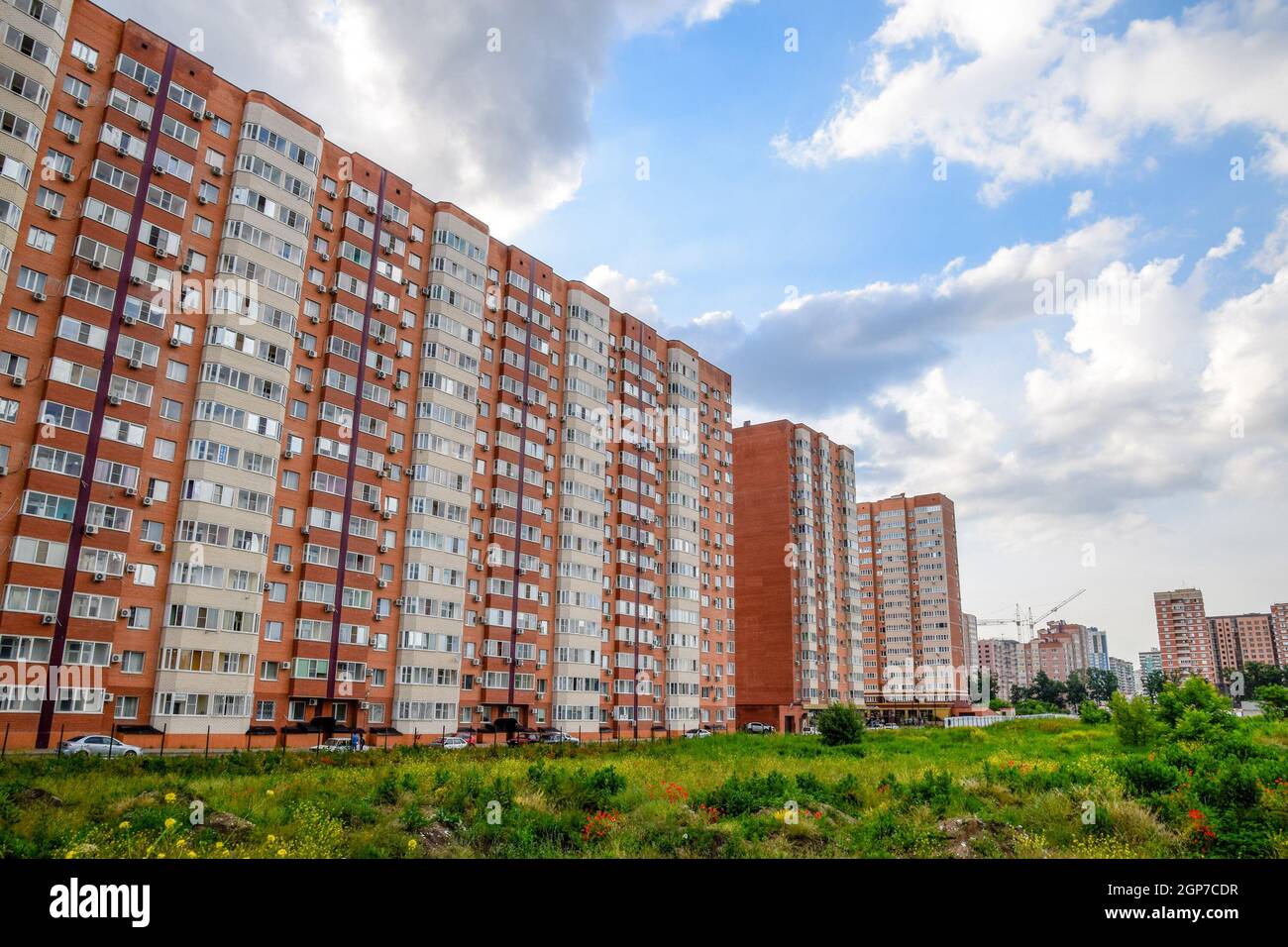 New storey residential building on the city street. Residential houses ...