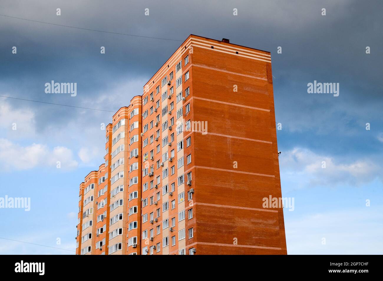 New storey residential building on the city street. Residential houses ...