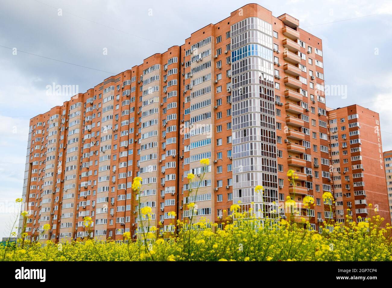 New storey residential building on the city street. Residential houses ...