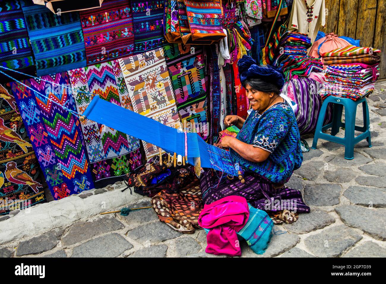 Woman weaving with loom, handicraft, Guatemala Stock Photo - Alamy