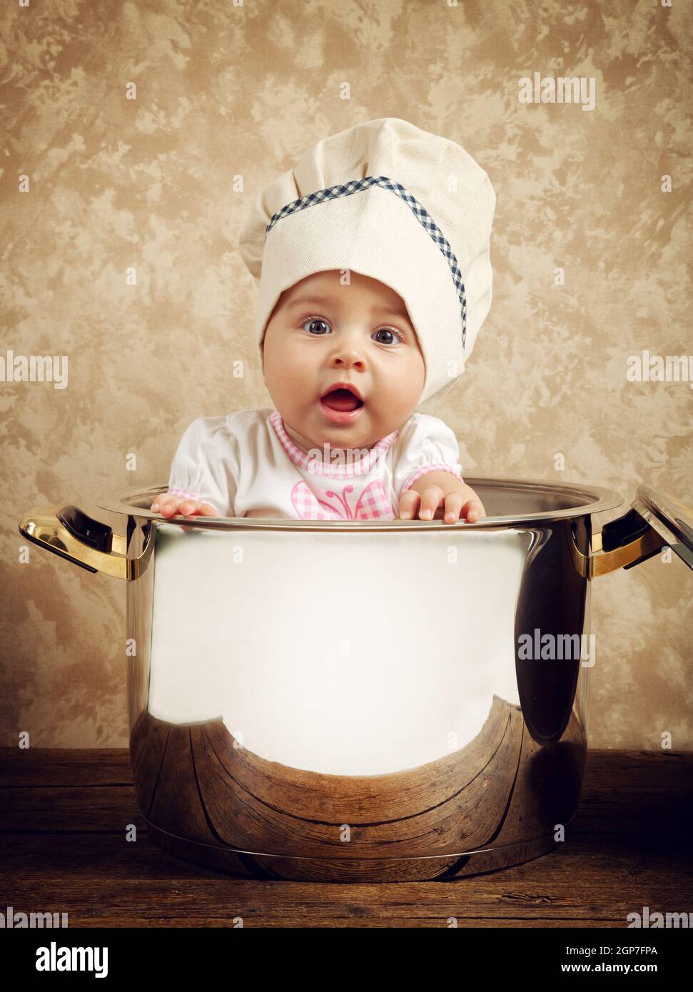 Cute baby in chef pot hi-res stock photography and images - Alamy