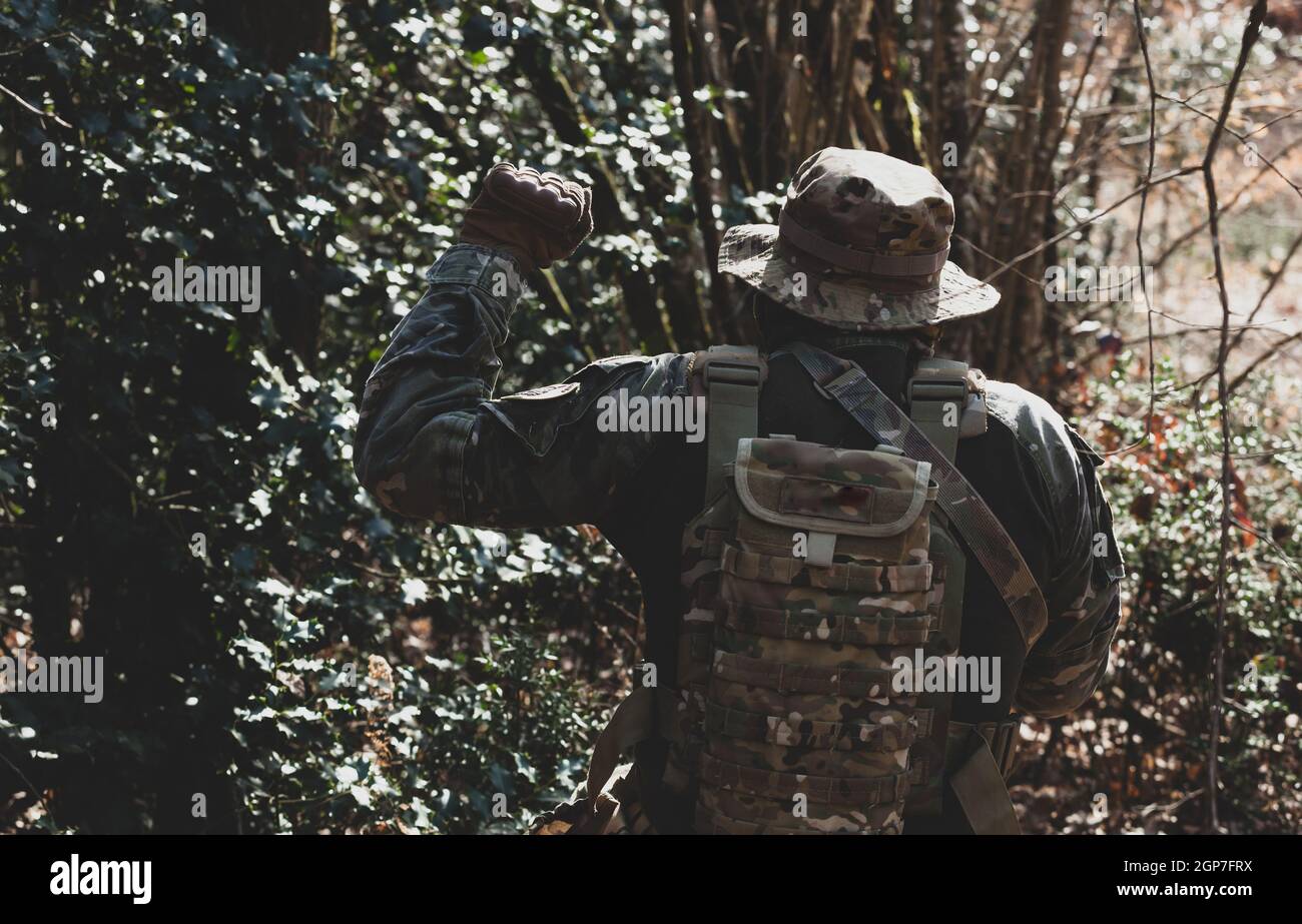 Armed man from back in uniform hi-res stock photography and images - Alamy