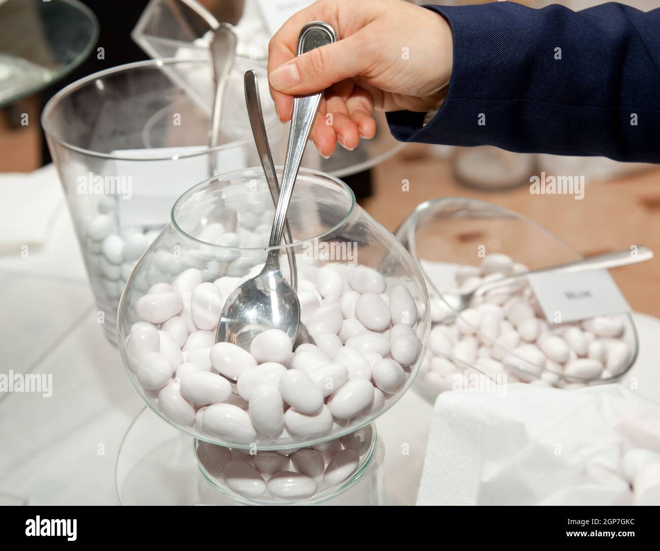 Wedding table with white confetti of different tastes Stock Photo - Alamy