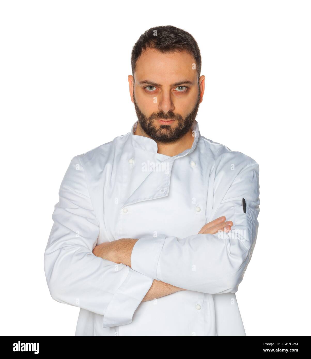 Young chef in white uniform without hat isolated on white background ...