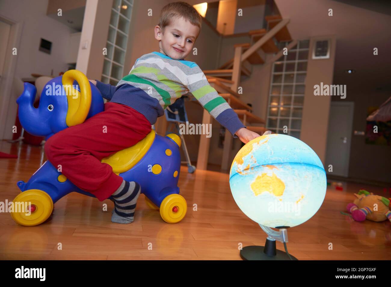 Little boy child playing with creative plastic toys indoor, building ...