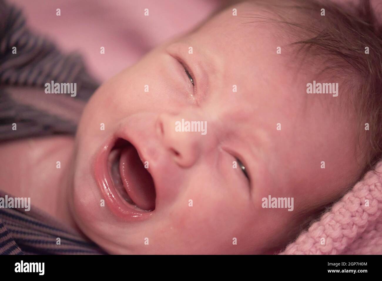 newborn baby crying and screaming cause is hungry Stock Photo - Alamy
