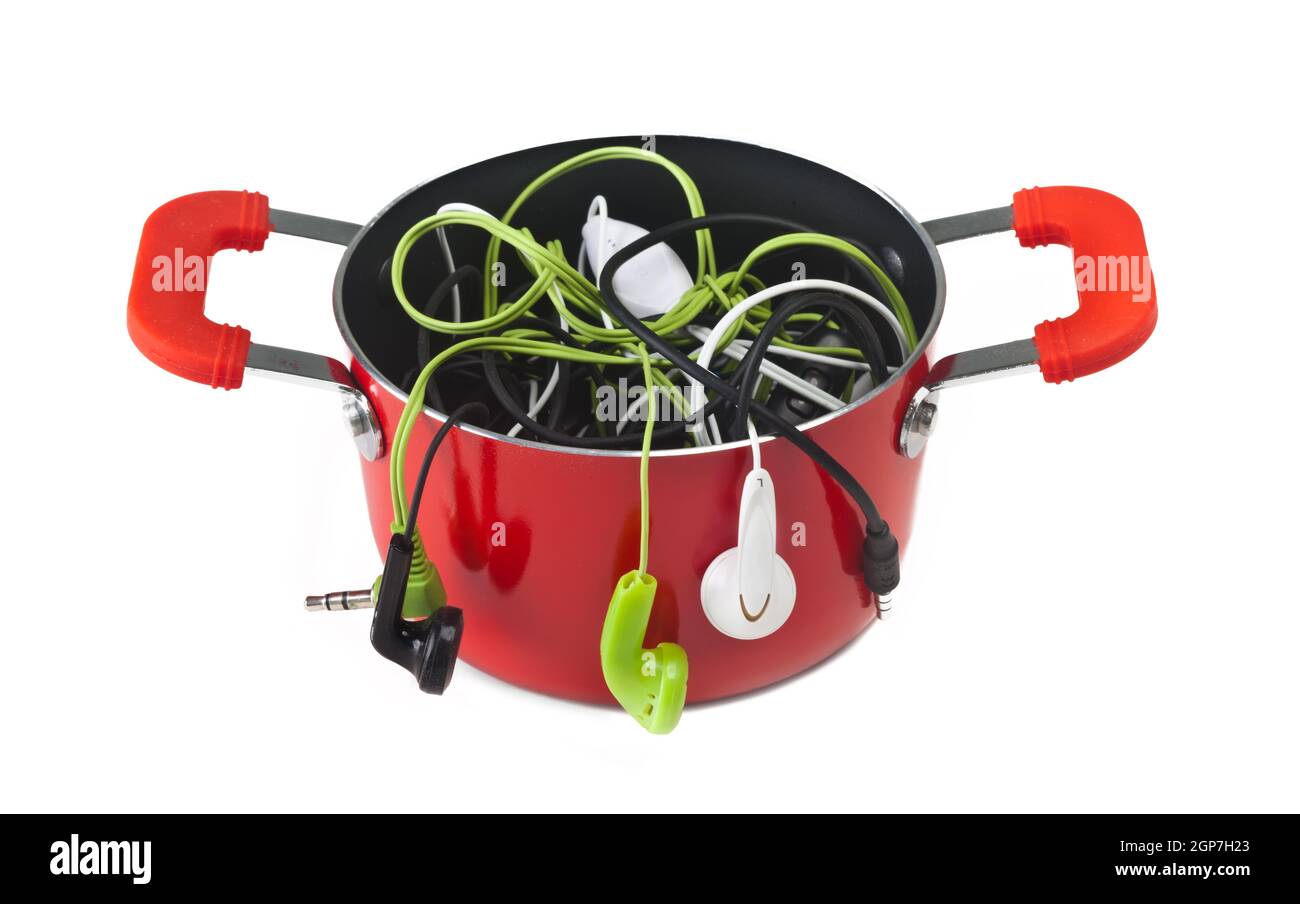 Music headphones in red pot on white background Stock Photo - Alamy