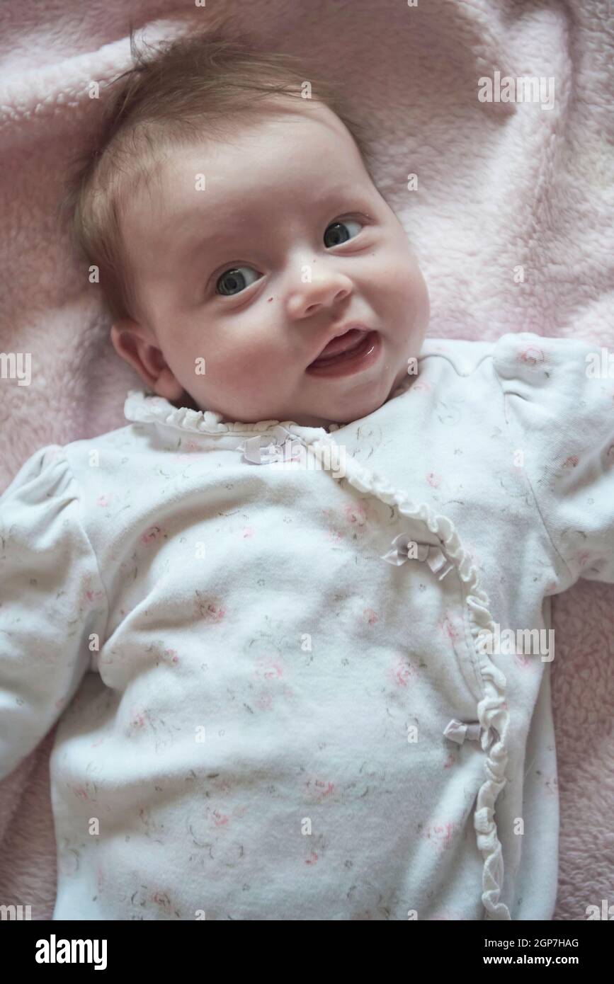 happy newborn little baby smilling portrait Stock Photo - Alamy