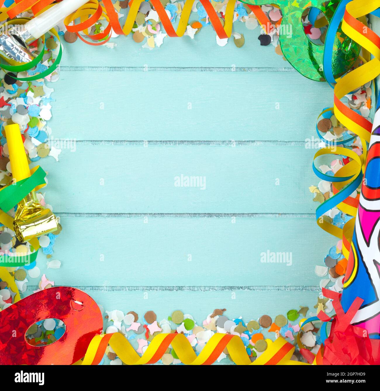 Empty square frame for celebration and carnival accessories on wood ...