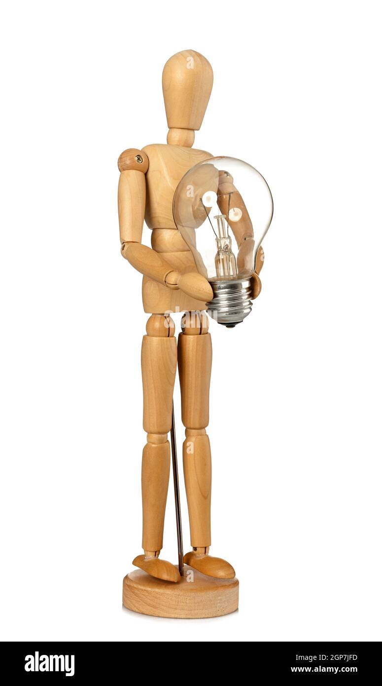 Wooden dummy that maintains a light bulb in hand on white background ...