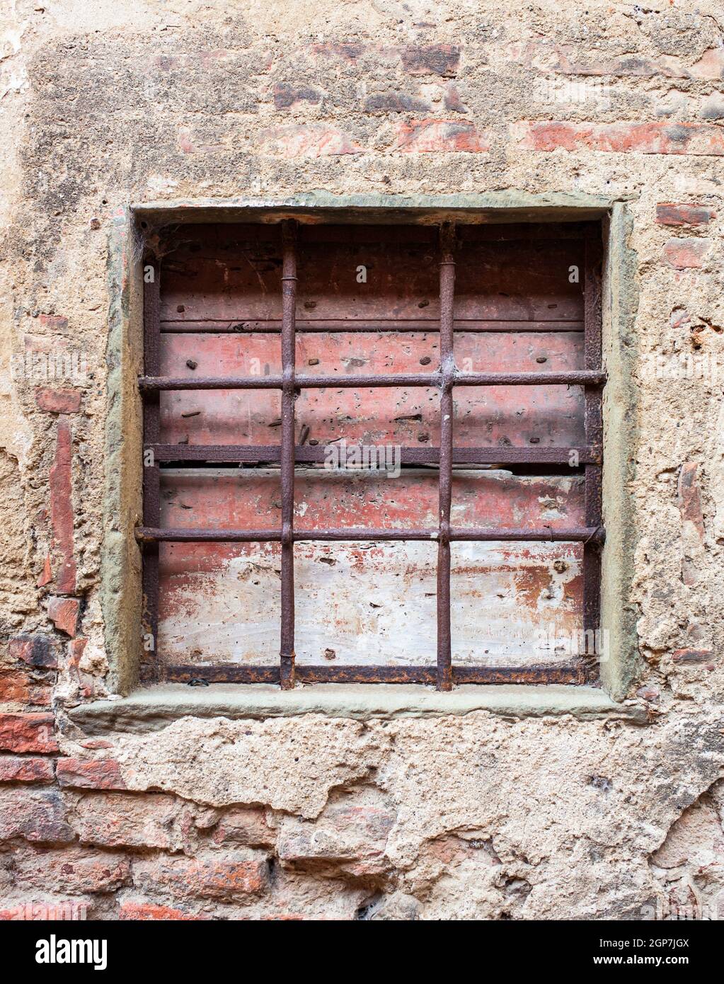 Old window with iron gratings of a house in Tuscany Stock Photo - Alamy