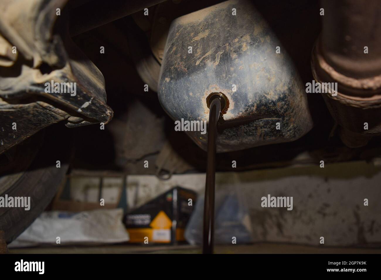 Drain the old oil from the engine through the drain plug. Changing the ...