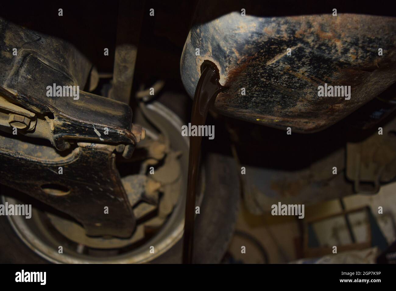 Drain the old oil from the engine through the drain plug. Changing the ...