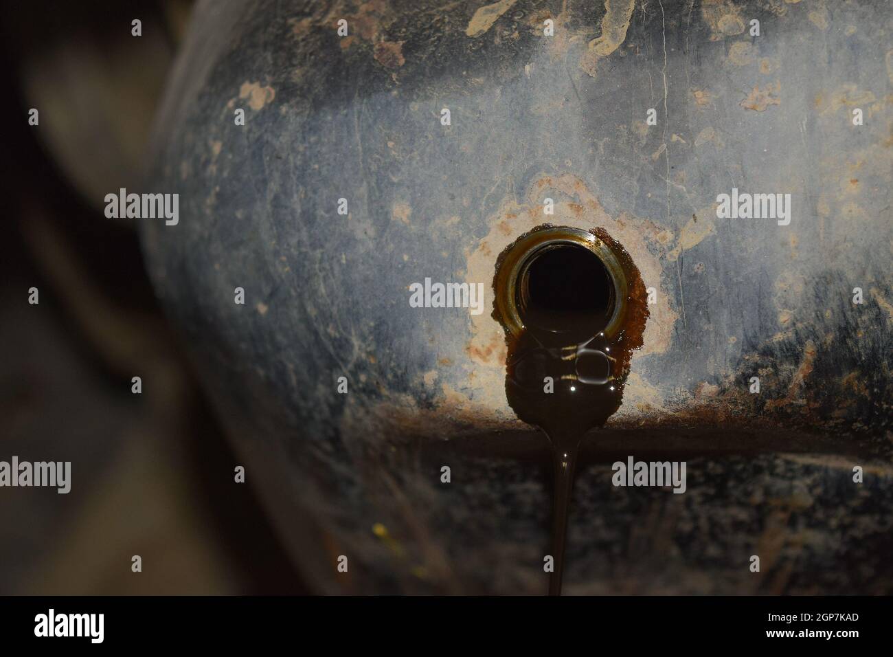 Drain the old oil from the engine through the drain plug. Changing the ...