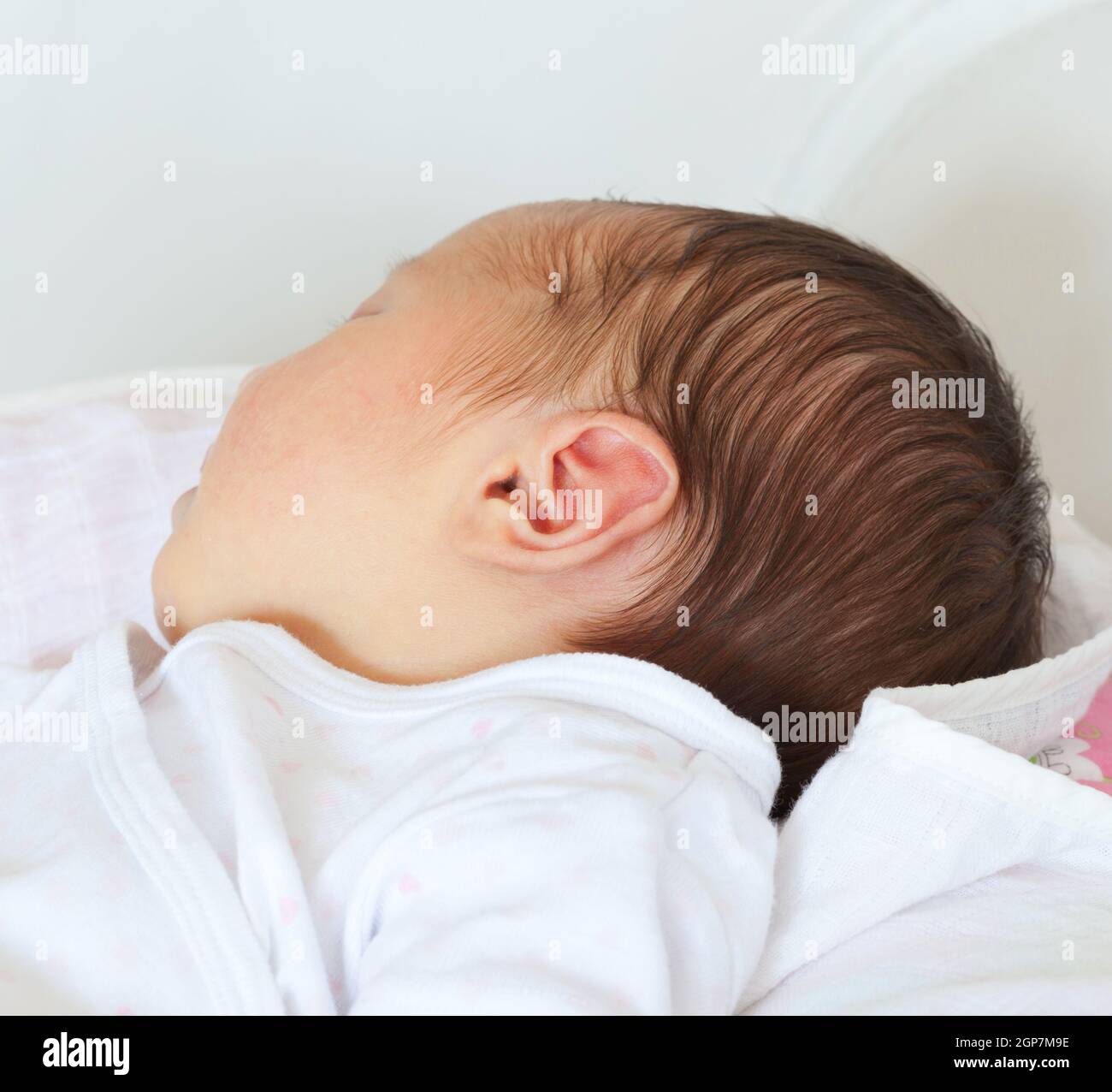Small delicate little ear of newborn baby girl Stock Photo - Alamy
