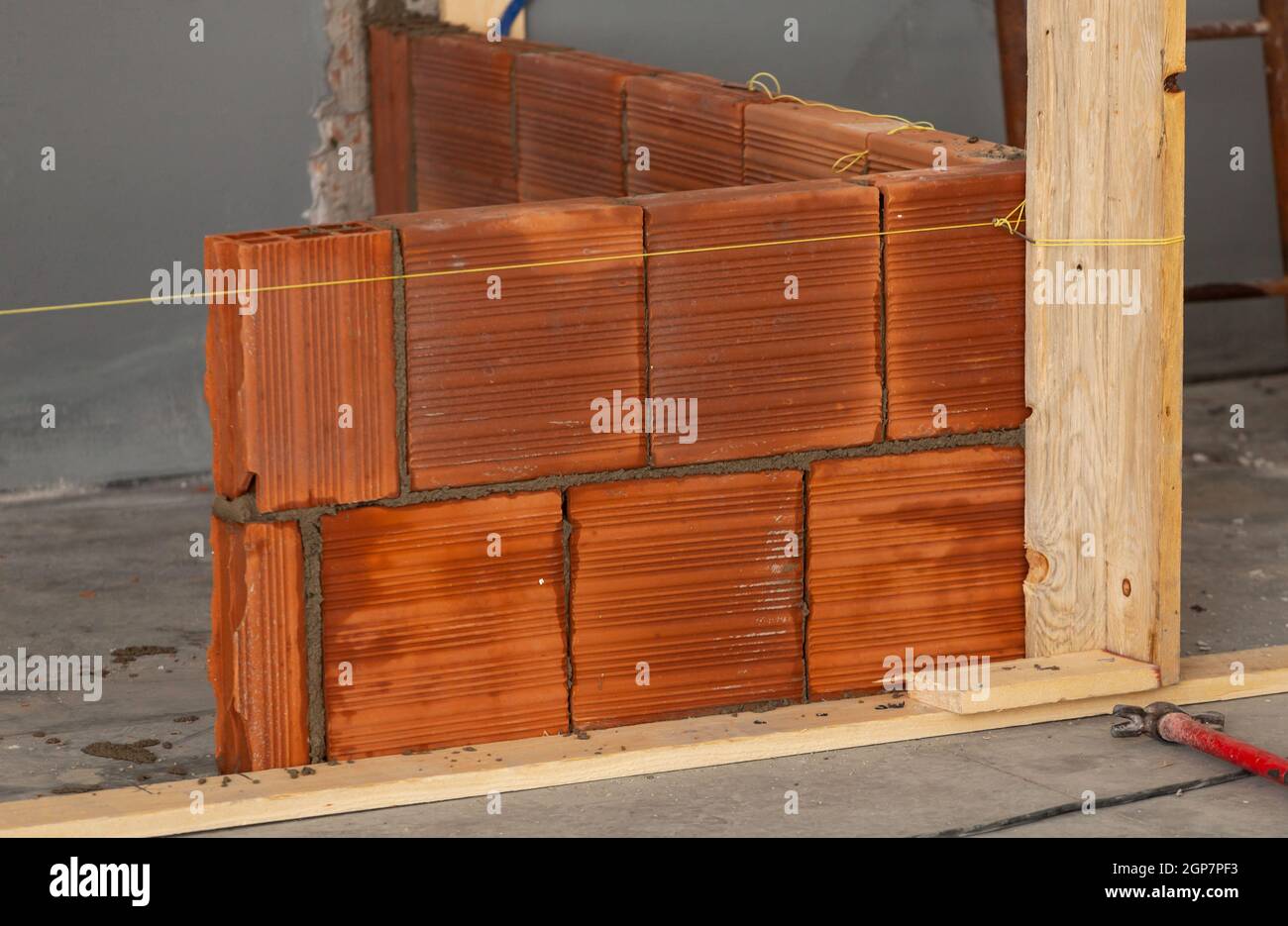 Masonry wall bricks. Building construction concept Stock Photo - Alamy