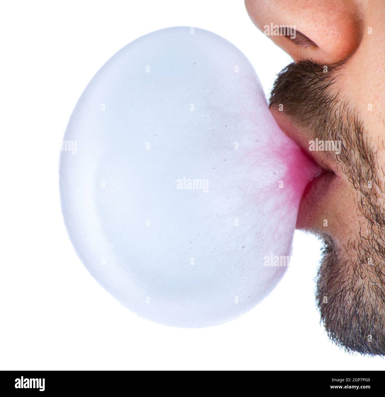 Man doing bubble with chewing gum on white background Stock Photo - Alamy